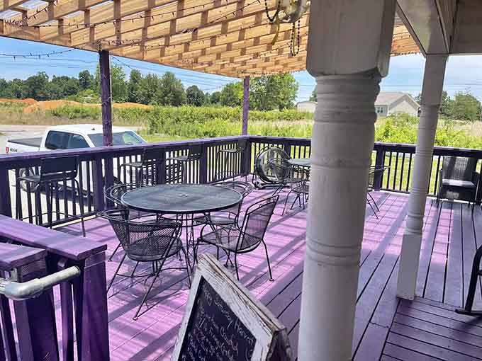 Purple porch seating offers the perfect spot to enjoy your meal with a side of fresh air.