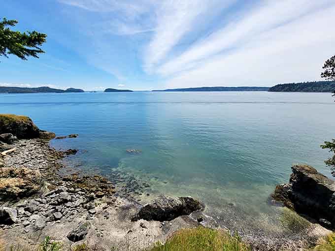 Crystal-clear waters and rocky shores create the perfect backdrop for contemplating absolutely nothing important.