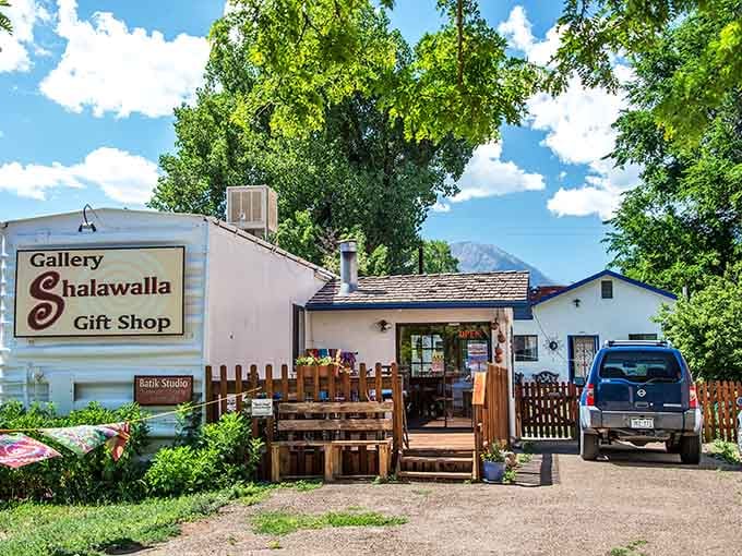 Shalawalla's colorful exterior hints at the creative treasures and handmade artistry waiting inside those adobe walls.
