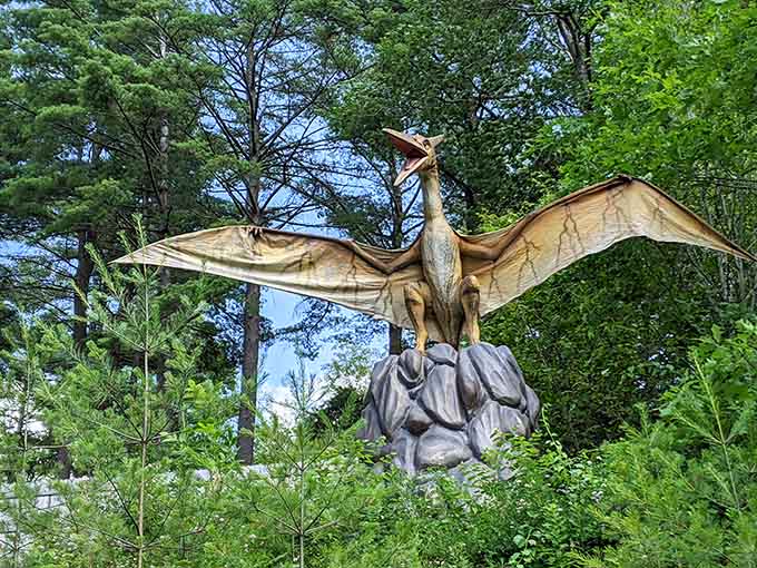The Pterodactyl perched dramatically overhead captures that Jurassic magic we've loved since Spielberg made dinosaurs cool again.