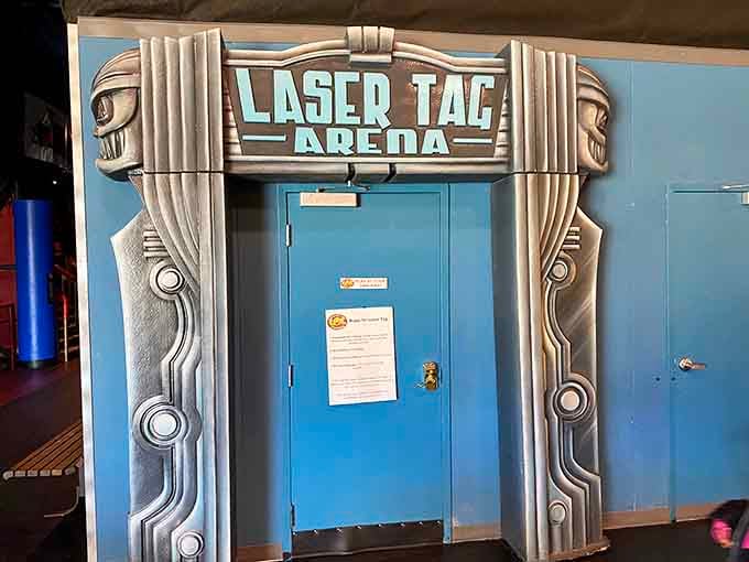 Laser tag arena entrance beckons, promising futuristic battles without the actual danger of real laser beams.