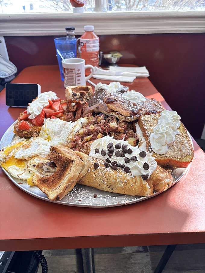 Someone ordered what appears to be every breakfast item available, creating a glorious monument to morning indulgence.