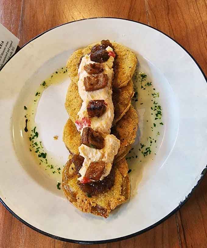 Fried green tomatoes stacked with pimento cheese, proving Southern appetizers deserve their own hall of fame.