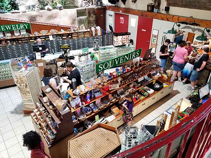 The bustling gift shop offers everything from polished stones to souvenirs, perfect mementos of your underground journey.