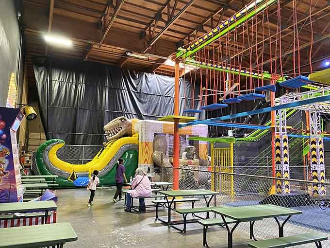 The serpentine slide curves through multiple levels, offering thrills that would make any water park jealous honestly.