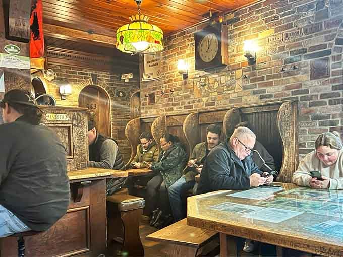 Wooden booths worn smooth by generations of diners create an atmosphere no designer could ever authentically replicate.