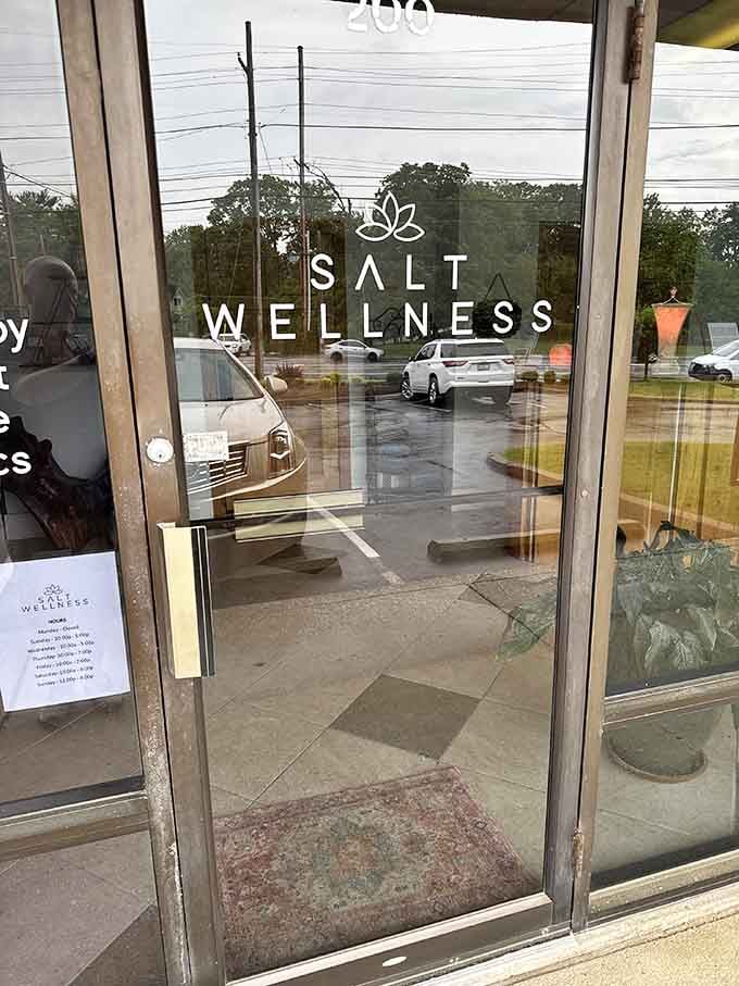 The entrance marked "Salt Wellness" on glass doors, your portal from everyday Louisville into something remarkably restorative and different.
