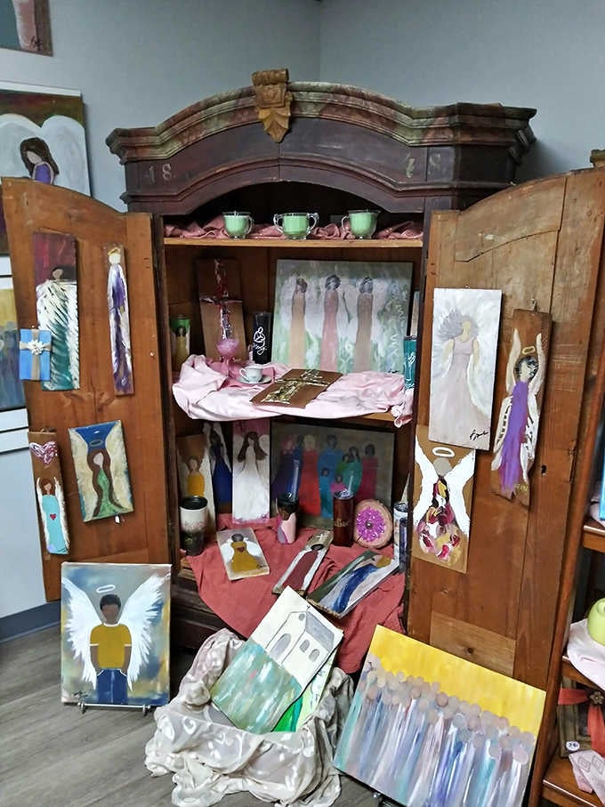 An antique wooden cabinet displaying treasures, proving that furniture can be both functional storage and conversation starter extraordinaire.
