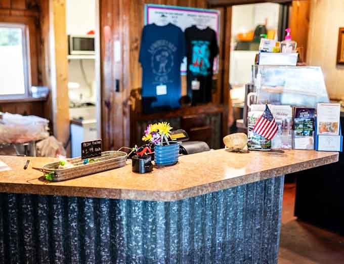 The welcoming counter displays local pride with its American flag and cheerful flowers greeting every hungry visitor who walks through.