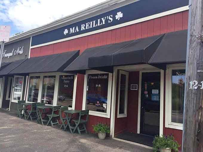 The Ma Reilly's storefront with shamrocks proudly displayed, because Irish hospitality and great food go together like, well, everything.