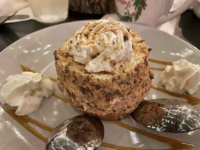 This dessert towers with whipped cream and caramel drizzle, the sweet finale your meal absolutely deserves after all that seafood.