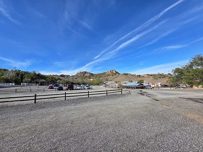 That parking lot view already hints at the adventure waiting beyond those hills and vineyards ahead.