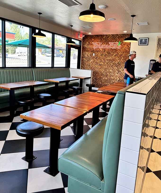Modern booth seating meets classic diner vibes, creating the perfect spot to demolish a burger guilt-free today.