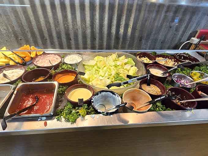 A fully-stocked salad bar with all the fixings means even your health-conscious friends can find something to enjoy here.