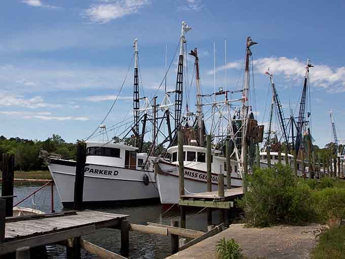 Parker D and Miss Georgia rest dockside, their white hulls gleaming like they're posing for a postcard shoot.