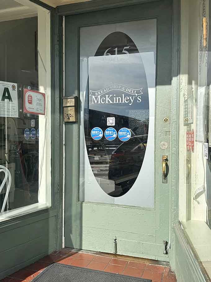 That welcoming entrance with its oval window is your portal to sandwich happiness and possibly your new lunch obsession.