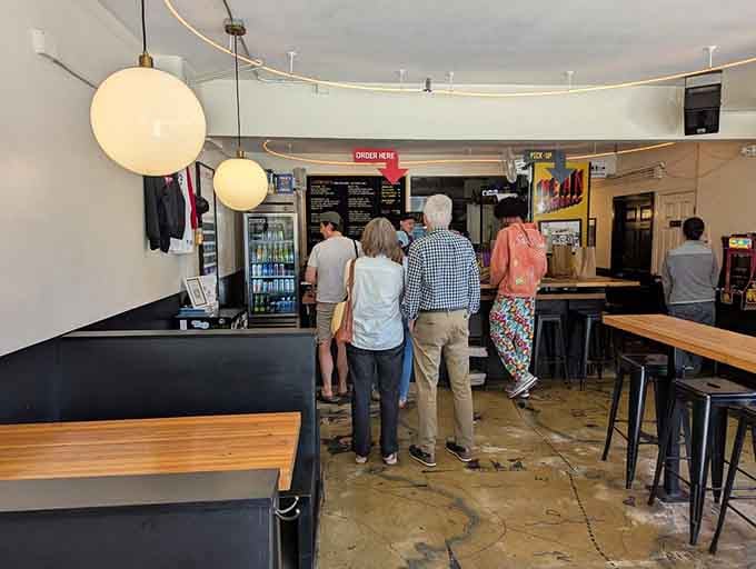 The lunch rush at Mean Sandwich looks like a pilgrimage of hungry souls seeking overstuffed salvation on ciabatta bread.