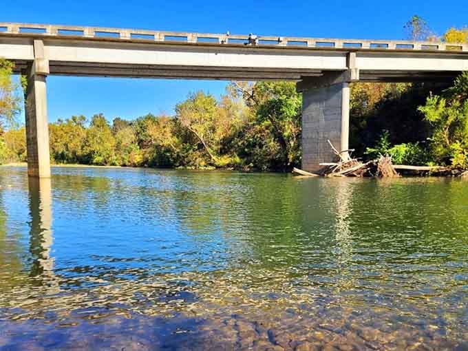 The Meramec River flows under this bridge like it's been doing for centuries, completely unbothered by modern life.
