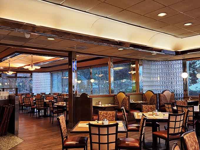 Spacious booths and tables where families gather and strangers become friends over shared appreciation for pancakes.