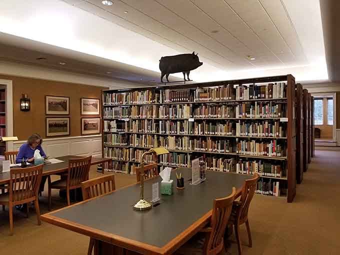 The National Sporting Library proves that even books and artifacts deserve elegant surroundings, complete with a pig sculpture overseeing scholarly pursuits below.