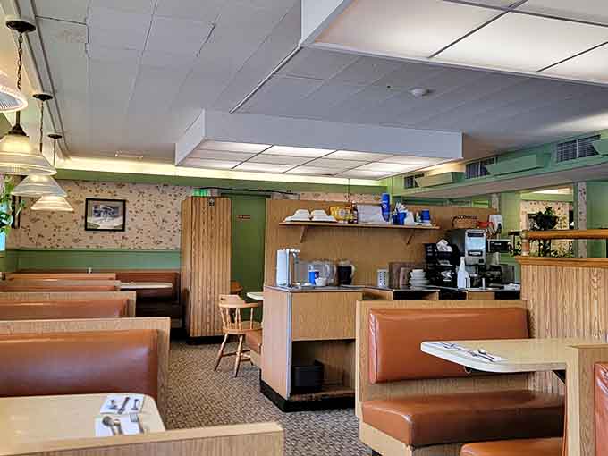 Vinyl booths that have been patched and loved for years, because good restaurants fix things instead of replacing them constantly.