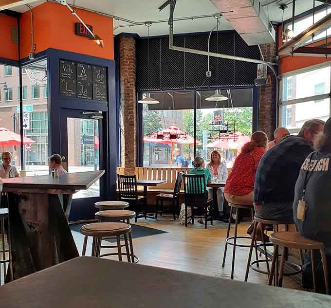 Real people enjoying real food in a relaxed atmosphere, this is neighborhood dining at its most authentic and welcoming.