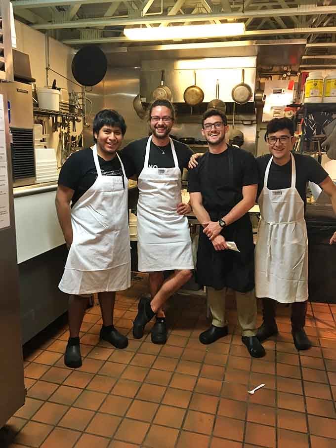 The kitchen crew behind the magic, turning fresh catches into memorable meals with skill and passion.