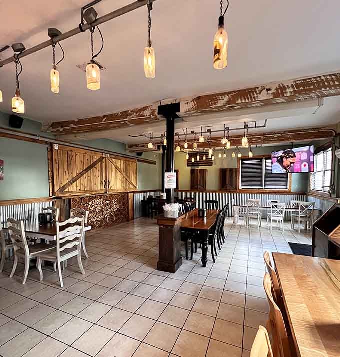 Rustic lighting and barn doors create an atmosphere where getting messy isn't just acceptable, it's practically mandatory.