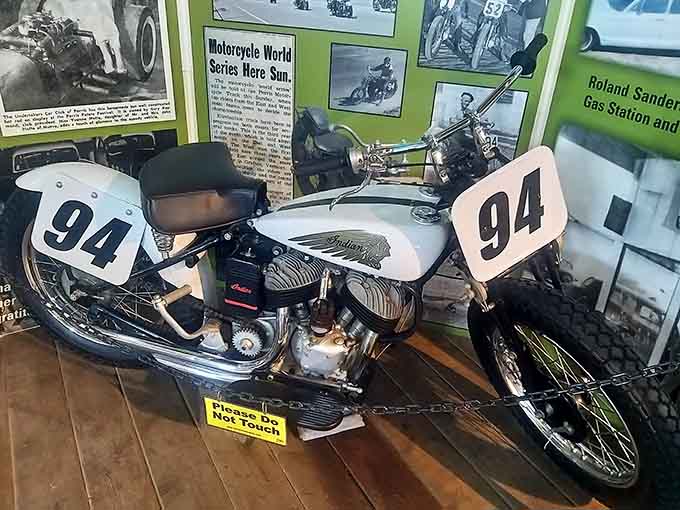 Racing number 94 sits ready for competition, this Indian motorcycle representing two-wheeled glory from motorsport's golden age of daring.