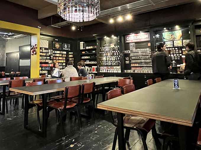 Tables filled with focused gamers prove that the best social media is actually sitting across from real humans having fun.