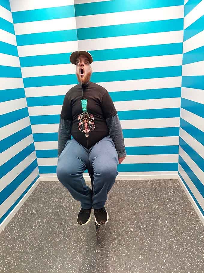 The Symmetry Room turns ordinary people into impossible optical illusions that would make Escher weep with joy and confusion.