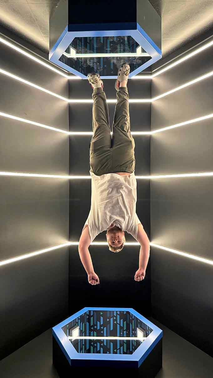 Lying upside down in an infinity tunnel creates photos that break Instagram and confuse your relatives.