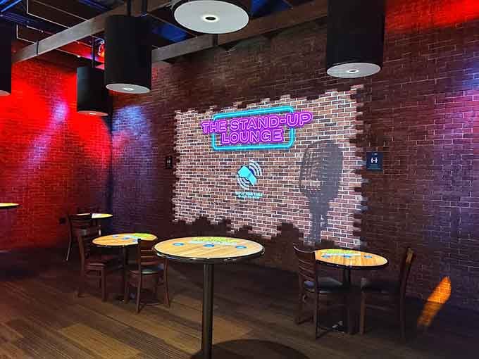The Stand-Up Lounge's neon sign and brick wall create that classic comedy club vibe without the two-drink minimum or hecklers.