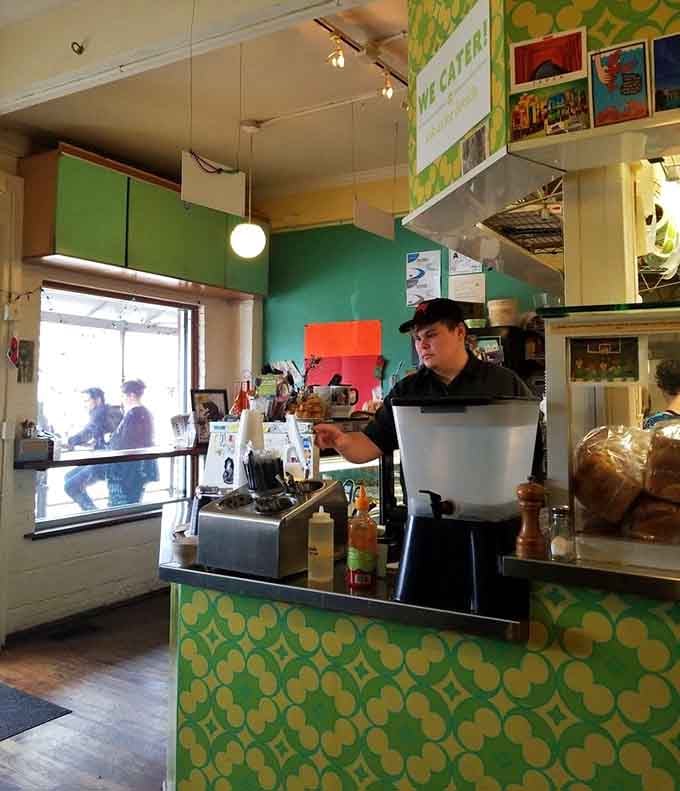 Order at the cheerful green counter where breakfast dreams and lunch cravings both come true every single day.