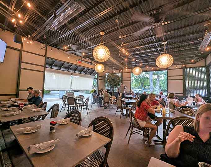 Happy diners enjoying their meals in a space that feels both sophisticated and wonderfully welcoming.