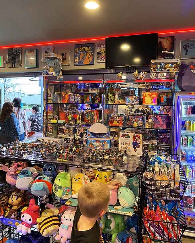 The retail area overflows with plushies, collectibles, and gaming treasures that'll tempt your wallet mercilessly.
