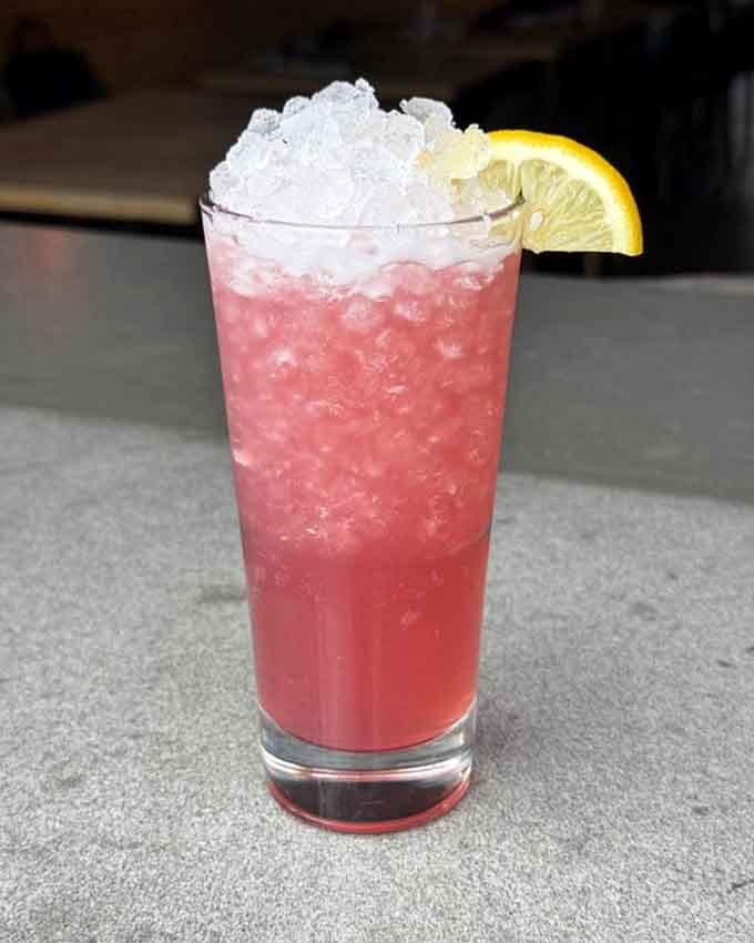 Pink lemonade topped with crushed ice screams summer refreshment, even when Colorado weather says otherwise.