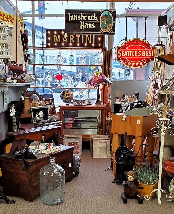 Vintage signage advertising martinis and coffee creates an eclectic vibe that somehow works perfectly together in context.