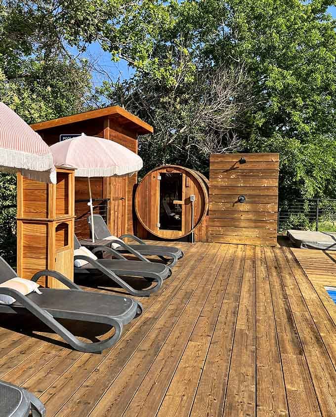 Barrel sauna meets poolside paradise, because apparently regular relaxation wasn't quite relaxing enough for some brilliant designer.