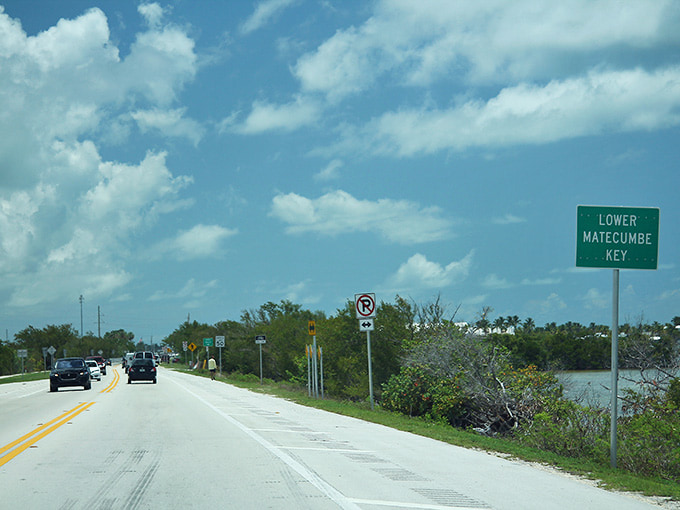 The Lower Matecumbe Key sign announces your arrival in a place where the journey matters more than checking off destination boxes.