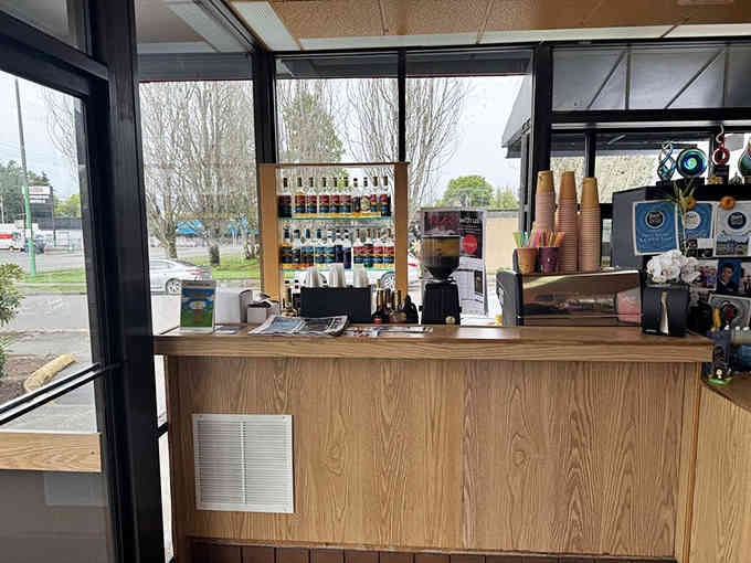 The espresso station stands ready to fuel your morning alongside whatever sweet treats you've chosen today.