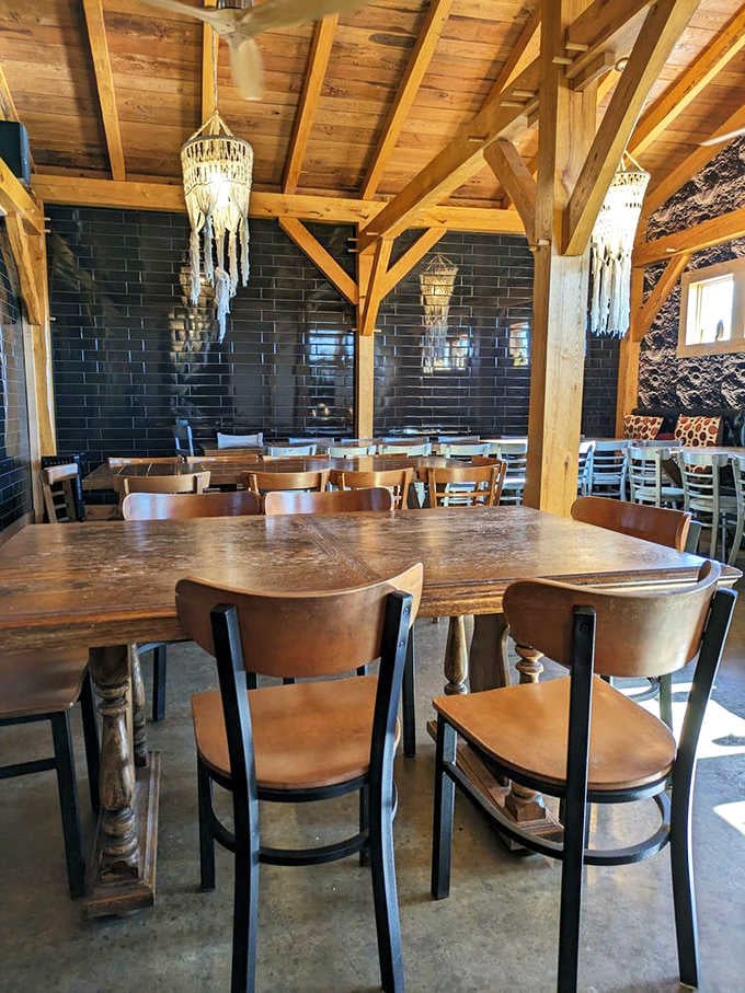 Those massive communal tables and soaring wooden ceilings invite lingering conversations over exceptional meals.