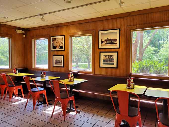 Natural light streams through windows onto cheerful tables where countless satisfied customers have lingered over empty plates.