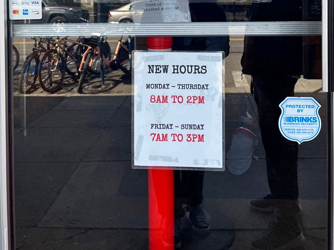 Operating hours posted clearly, because knowing when to get your biscuit fix is crucial life information, friends.