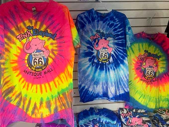 Official Pink Elephant merchandise proving you can literally wear your love for quirky roadside attractions with pride.