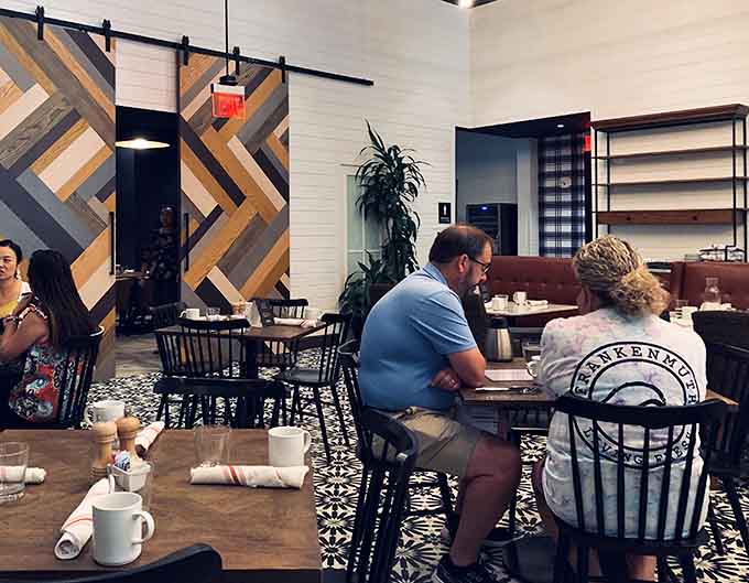 Diners enjoy their meals in a space that feels both contemporary and genuinely welcoming.