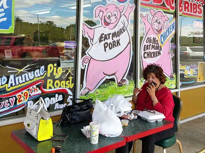 Window art celebrating pork and chicken with the enthusiasm they truly deserve, because why be subtle about greatness?