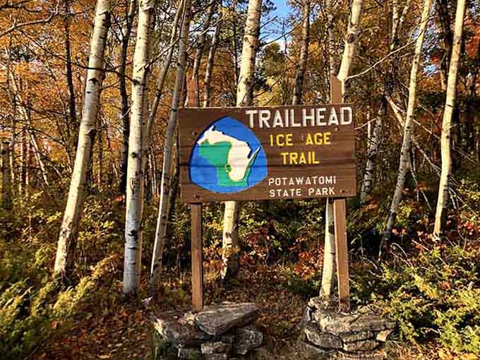 Trail signs that promise adventure without requiring a sherpa or survival training to enjoy.