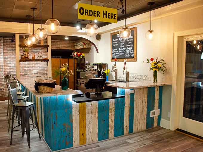 The order counter beckons with its colorful reclaimed wood, promising good things are about to happen here.