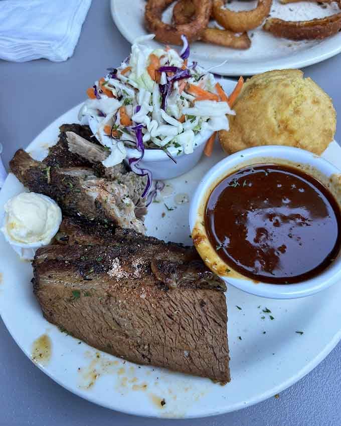 Pulled pork and brisket sharing a plate like old friends who bring out the best in each other.